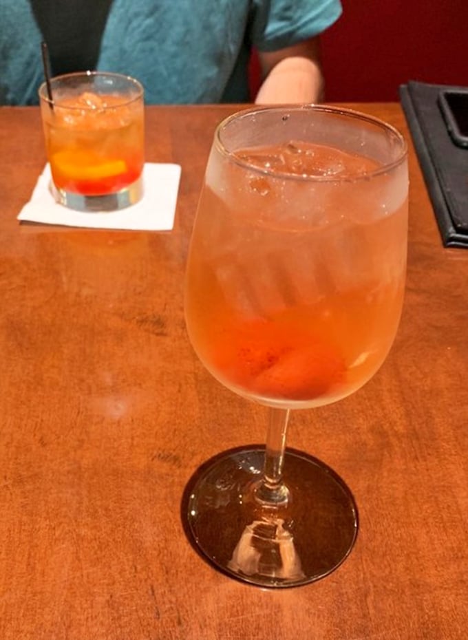 Cocktails that don't need tiny umbrellas to make a statement. That sangria isn't just refreshing—it's what summer would taste like if seasons came in glasses.