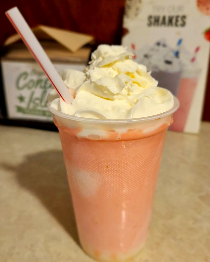 A strawberry shake topped with whipped cream that's not just a drink but a dessert worthy of its own Instagram account – if Instagram existed when this place opened.
