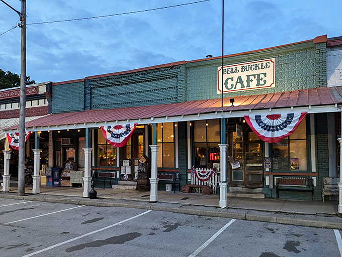Dusk settles on the Bell Buckle Café, its warm glow promising homestyle cooking that would make your grandmother both proud and jealous.