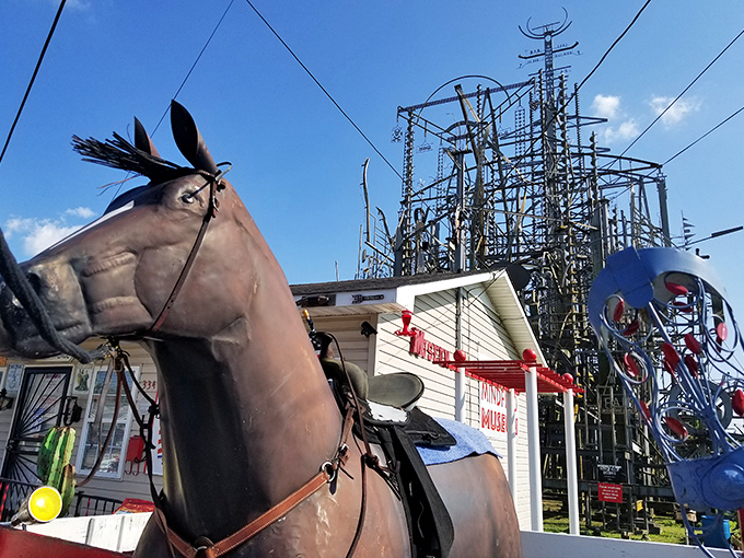 The juxtaposition of horse and metal machinery creates a perfect "then meets now" moment that defines rural American art.