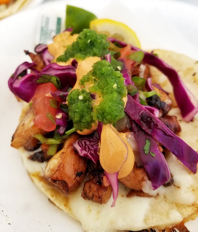A colorful taco that proves El Momo's talents extend beyond pork. Like finding out your favorite band can play multiple instruments—impressive range.