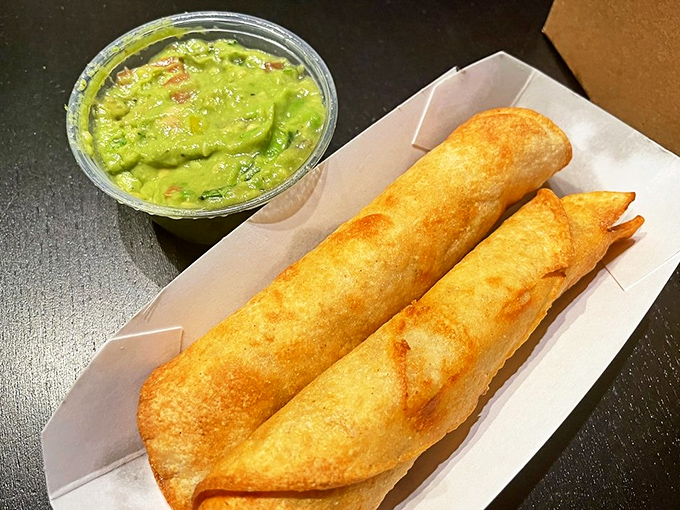Golden-fried taquitos with guacamole – proof that Tops understands California's culinary heritage better than most.