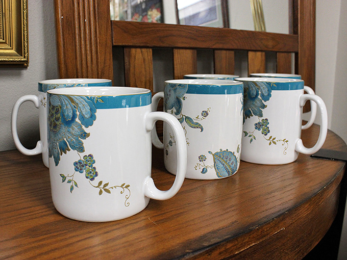 These aren't just mugs—they're morning companions with personality. Elegant blue flourishes transform ordinary coffee into a sophisticated ritual without the upscale price tag.