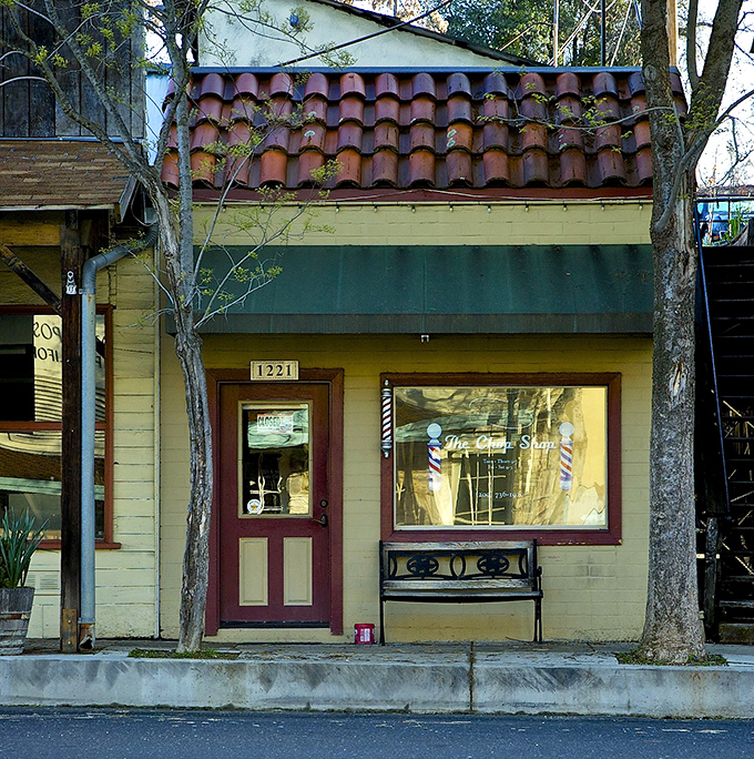 This quaint barbershop window promises more than just a haircut—it's offering a slice of small-town Americana with every snip.