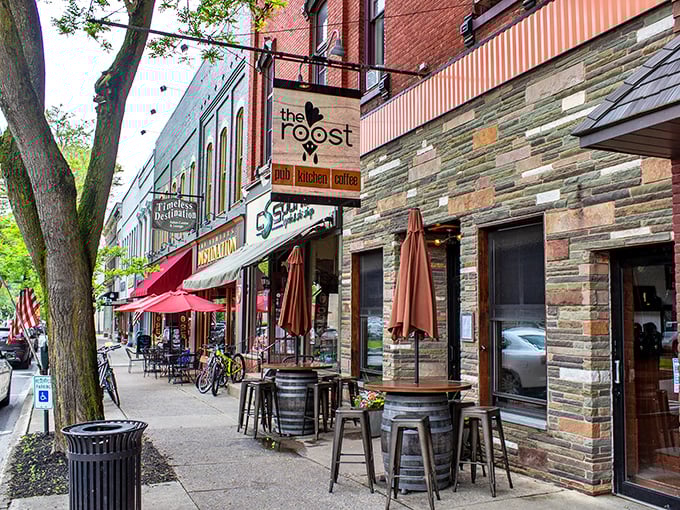The Roost's inviting outdoor seating beckons with barrel tables and the promise of people-watching—the original social media that pairs perfectly with coffee.