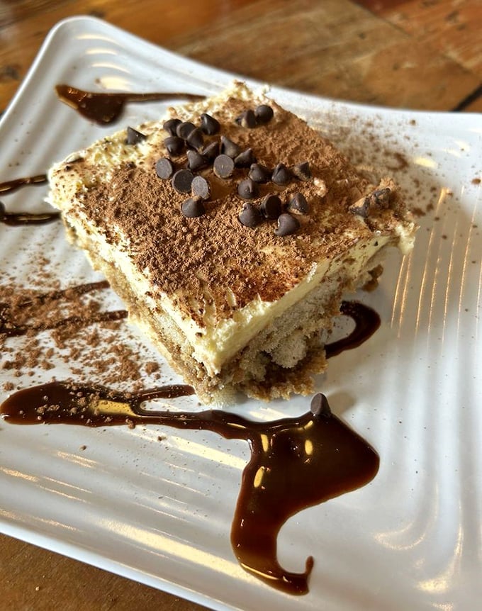 Tiramisu that doesn't mess around. Those chocolate chips aren't just decoration—they're exclamation points at the end of a perfect meal. 