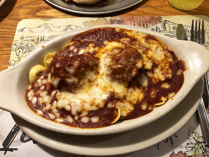 Tortellini swimming in red sauce with meatballs standing guard. This dish doesn't just satisfy hunger—it creates memories that linger long after the plate is clean.