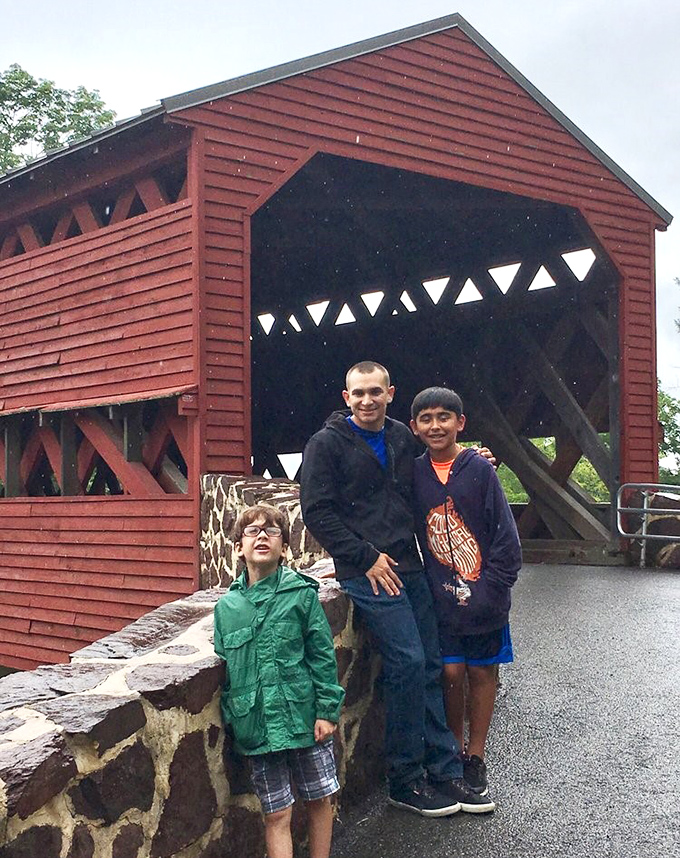 Rain can't dampen the enthusiasm of visitors discovering this architectural treasure—some history is worth getting a little damp for.