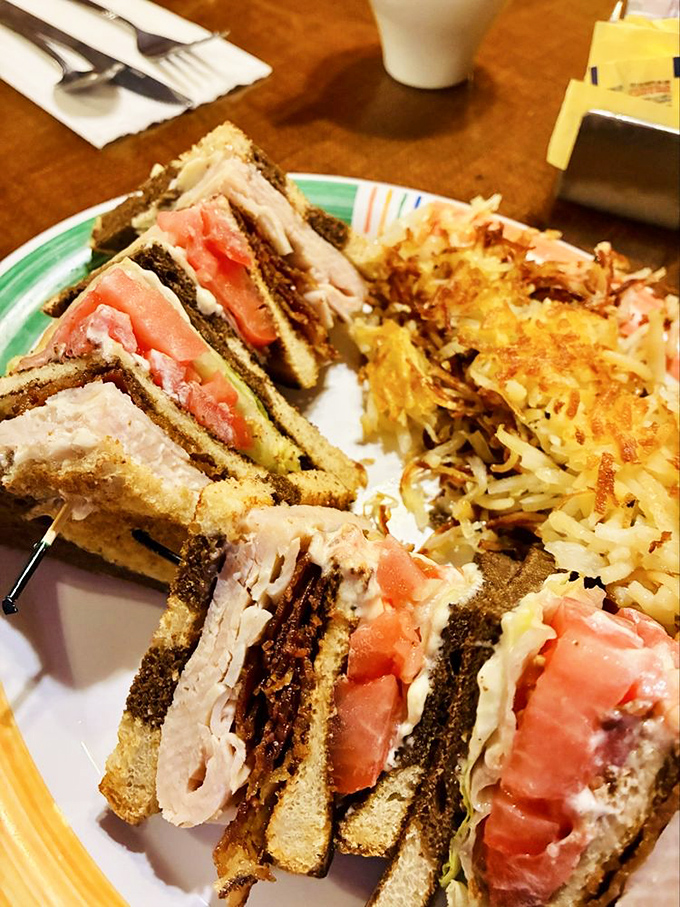 A club sandwich that's layered like a good story—with plot twists of turkey, bacon, and tomato between toasted chapter breaks.