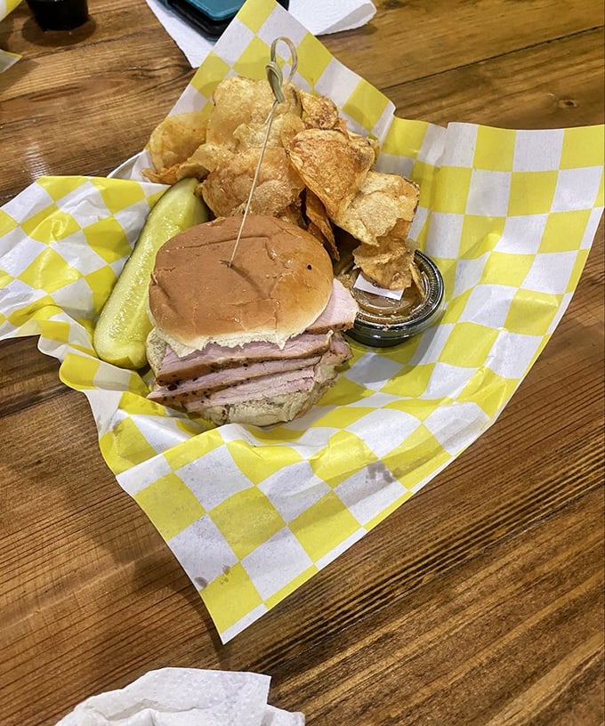 Turkey that's been smoked to perfection, stacked generously on a bun—proof that Thanksgiving shouldn't be just once a year.