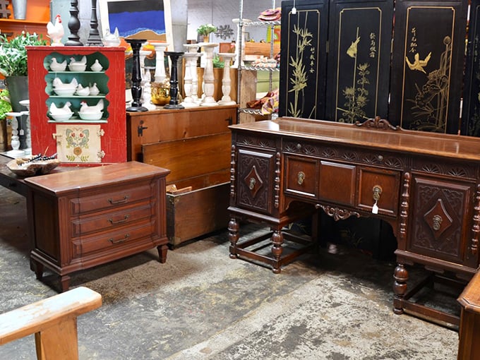 Dark wood meets intricate craftsmanship in this furniture grouping – pieces that survived decades before "fast furniture" was even a concept.
