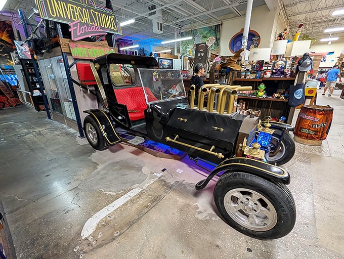 This vintage vehicle isn't just transportation—it's automotive theater. Universal Studios memorabilia in the background hints at its showbiz connections.