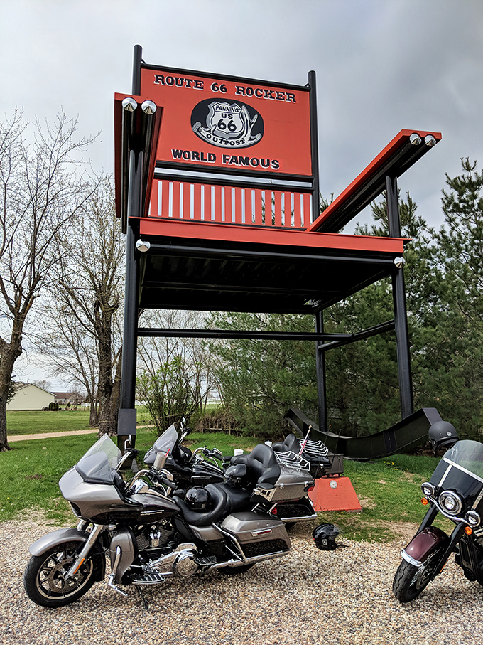Motorcycle groups regularly make pilgrimages to the Red Rocker, their gleaming machines looking like toys beside this monumental piece of furniture.