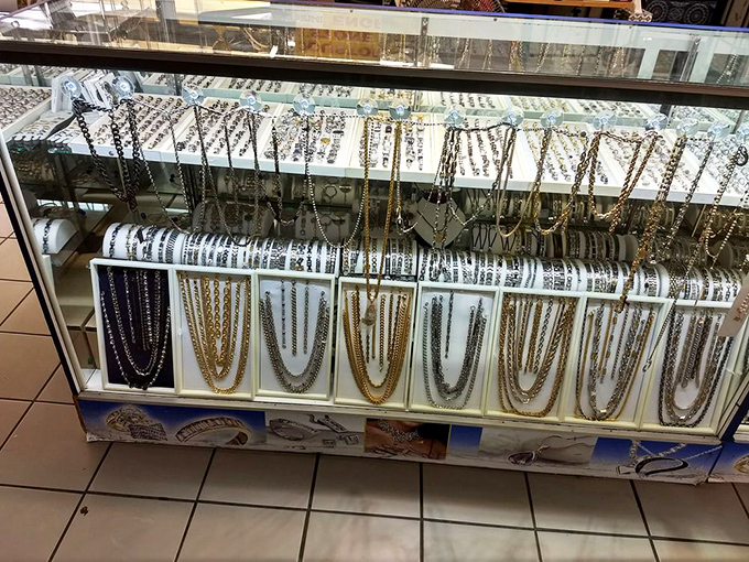 Glitter and gold for days! This jewelry display showcases enough bling to make Mr. T consider adding a few more chains to his collection.