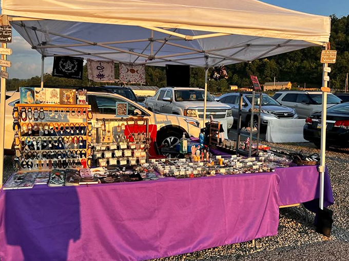 A purple-draped wonderland of sparkle and shine. This jewelry display transforms a parking lot into an accessory department that would make any mall jealous.