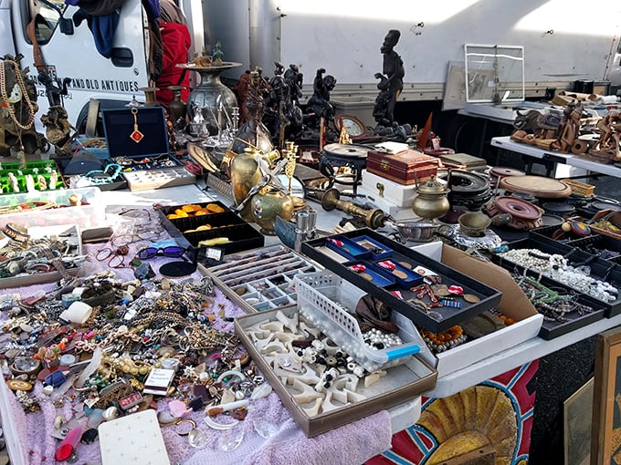 Antique alchemy at work—brass figurines, vintage jewelry boxes, and curios that transform ordinary shelves into museums of personal history.