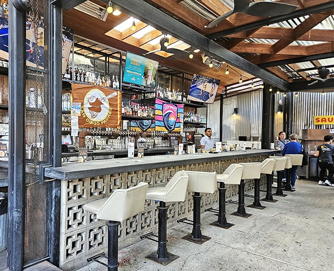 The bar doesn't just serve drinks; it creates liquid companions for your chicken journey, with enough bottles to satisfy any cocktail craving.