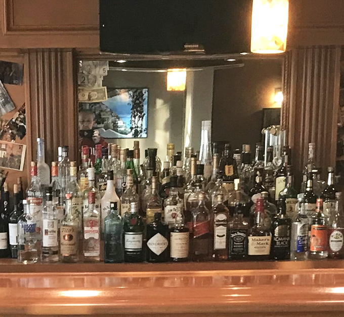 A bar stocked better than most people's retirement portfolios—liquid assets you can actually enjoy now.