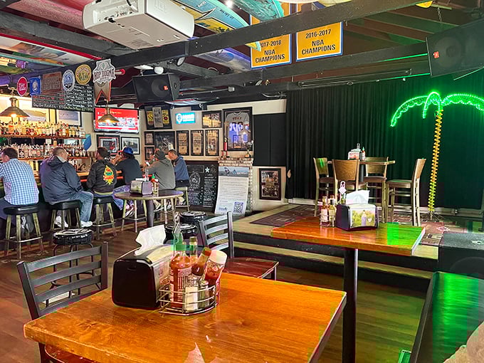 The bar side dining area—where strangers become friends and friends become family over pints and plates of seafood excellence.