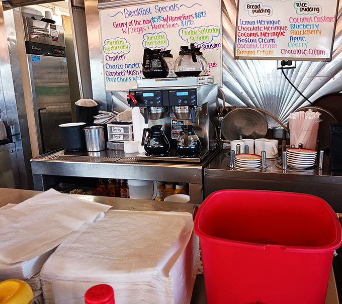 The coffee station—command central for the lifeblood of any respectable diner, where mugs are filled and morning grumpiness goes to die.