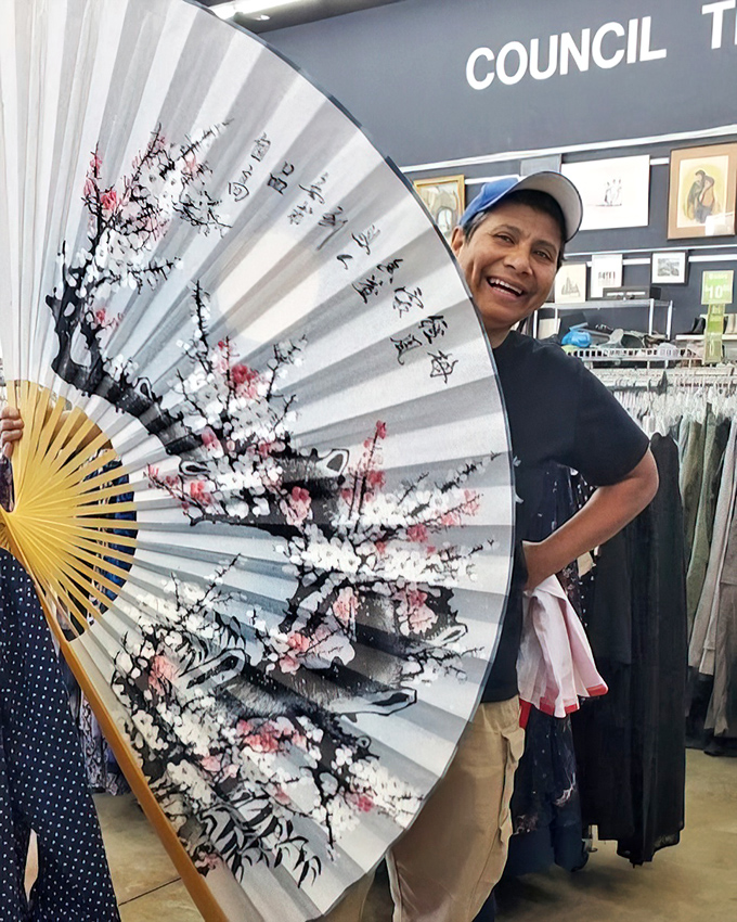 This decorative fan isn't just beautiful—it's large enough to cool you down when you realize you just found designer jeans for under $10.