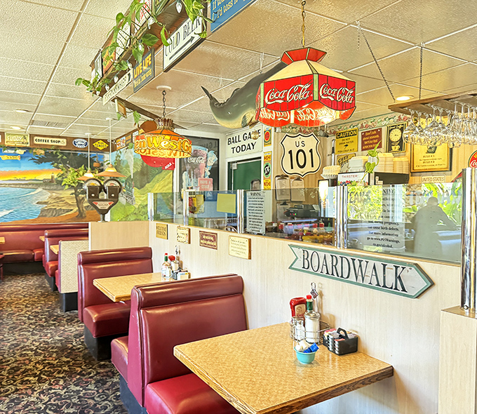 Vintage booths and nostalgic decor create the perfect backdrop for life's important decisions – like whether to order the pancakes or the waffles.