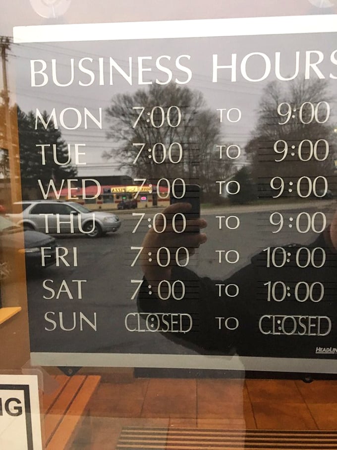 Business hours that respect both early birds and night owls. The closed Sunday policy ensures even comfort food professionals get their day of rest.