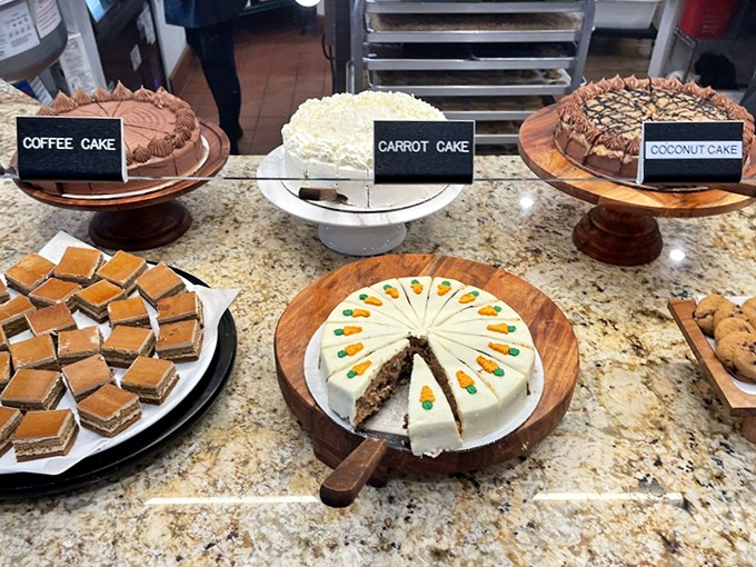 The dessert section proves that happiness comes in many forms—carrot cake, coffee cake, and those little squares of sweet nostalgia.