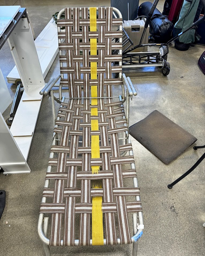 This retro lounger with its brown-and-yellow webbing isn't just furniture—it's a time machine to 1970s backyard cookouts and sunburned naps. 