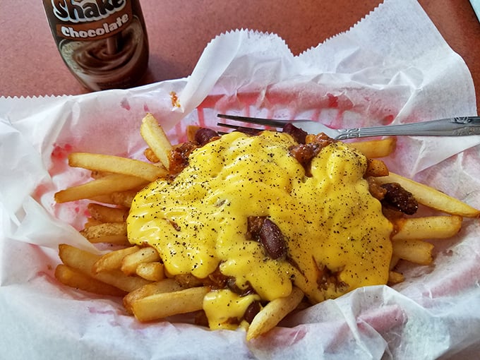 Cheese fries that don't apologize for being exactly what they are—gloriously indulgent. The perfect companion for a chocolate shake and zero regrets.