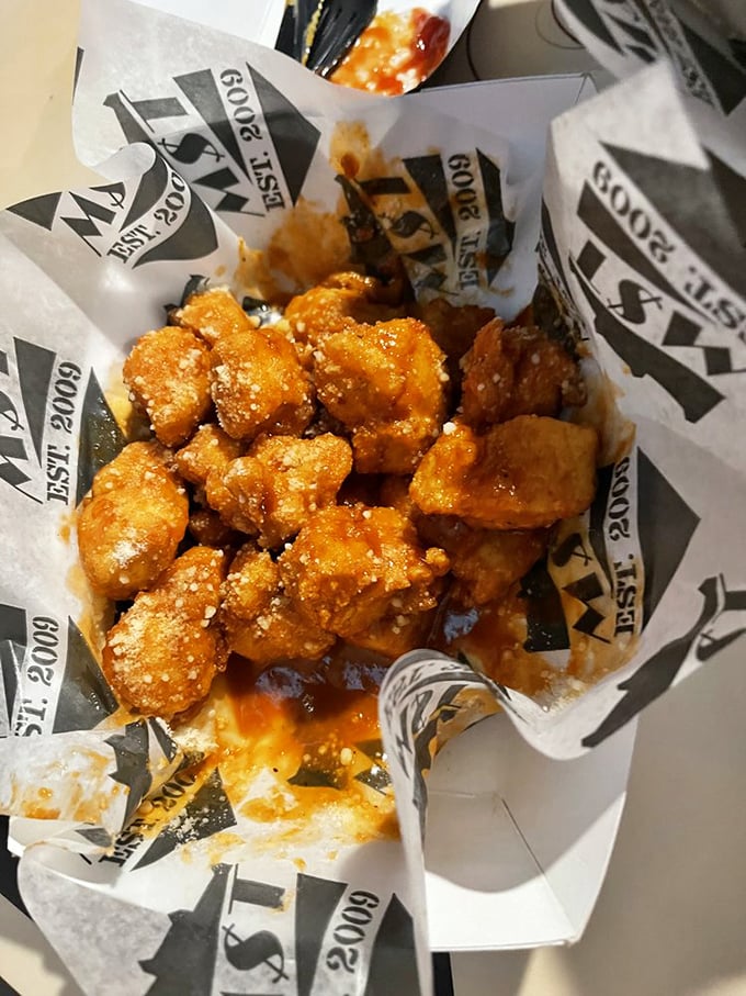 Golden-fried chicken chunks glistening with sauce—like little flavor bombs waiting to detonate on your taste buds. Resistance is futile.