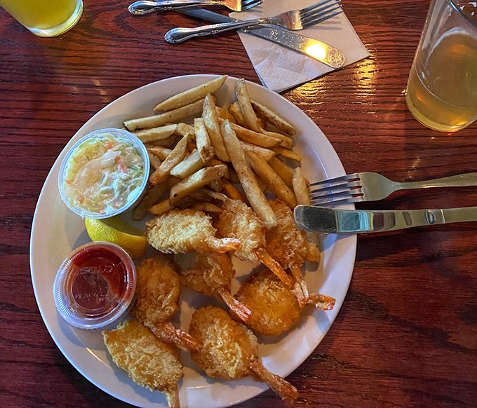 Coconut shrimp that actually taste like coconut—what a concept! These golden beauties with their crisp coating are ocean-meets-tropics perfection.