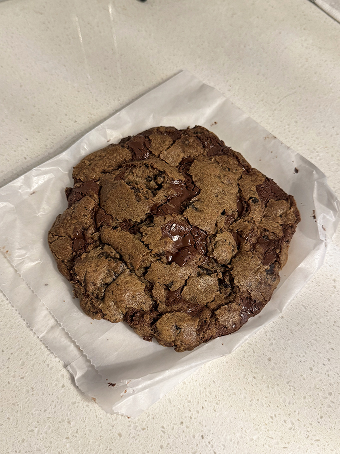 A chocolate cookie with the perfect balance of crisp edges and gooey center. Some desserts don't need to be complicated to be memorable.