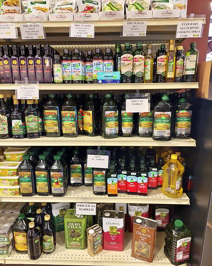 Olive oil bottles stand like sophisticated sentinels among everyday cooking essentials—gourmet ingredients without the gourmet markup.