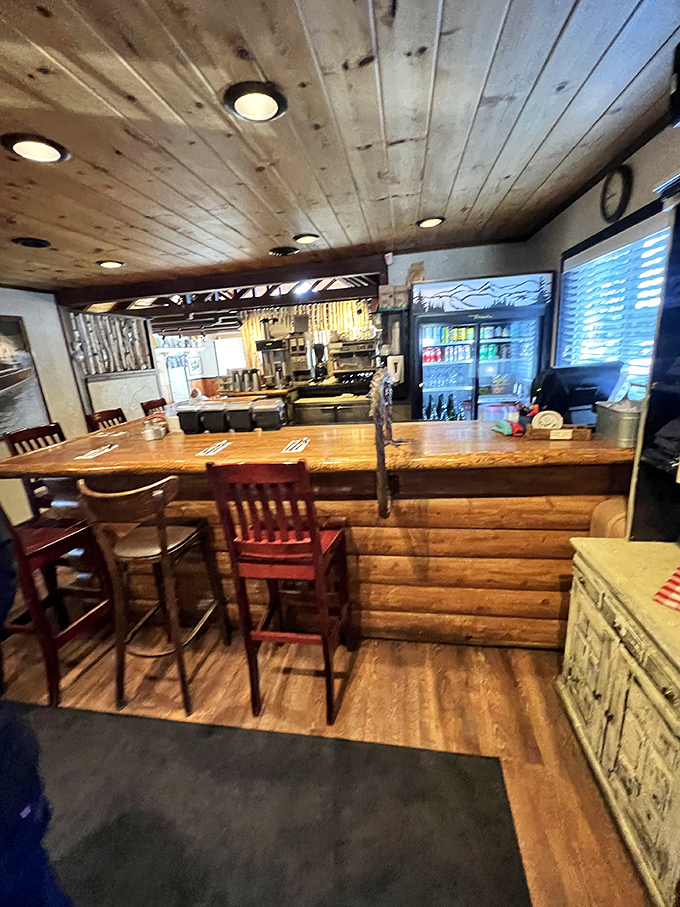 Pull up a chair at the counter for a front-row seat to breakfast theater—where wooden beams and rustic charm set the stage for culinary magic.