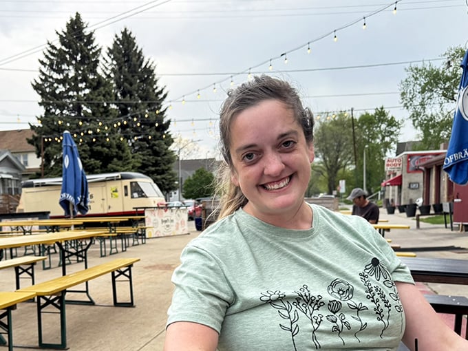 Pure joy captured in a moment – this is what happiness looks like when potato pancakes are involved.