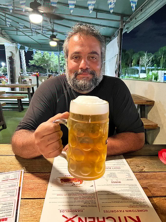 The universal expression of beer happiness—a proper German stein, filled to the brim, creating memories that last longer than the foam.