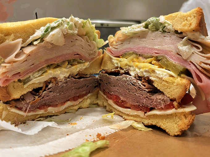 This towering creation doesn't just feed you – it dares you. Every layer tells a different delicious story.