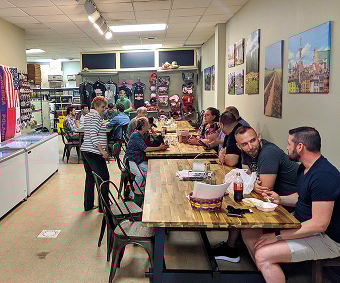 The communal tables aren't just for eating—they're where strangers become friends over shared plates and the universal language of "mmmmm."