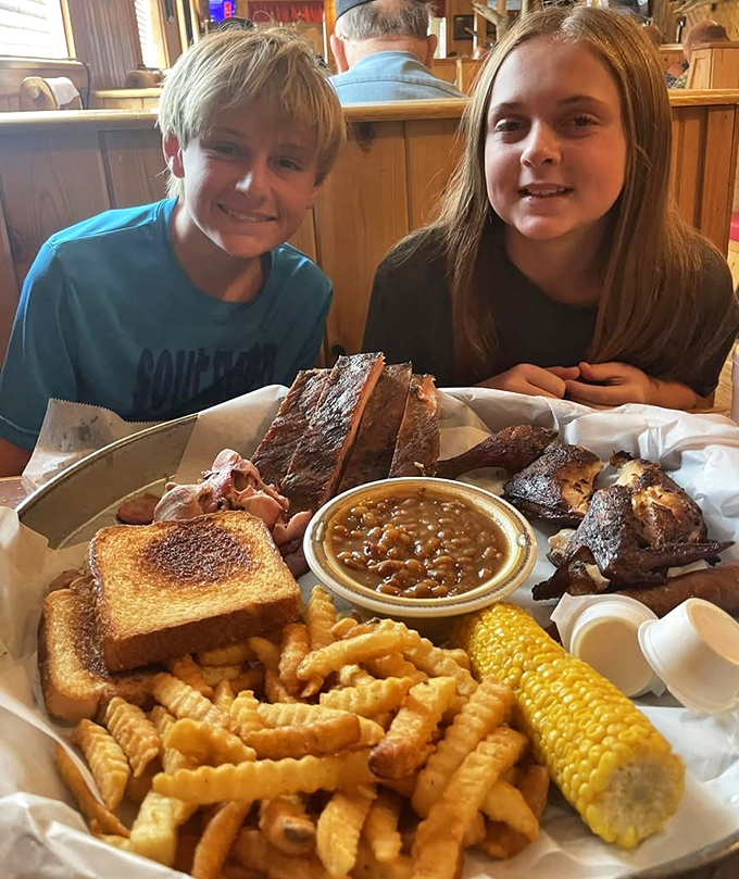 The universal language of barbecue bringing generations together. That tray isn't just holding food—it's creating memories that will outlast the meal.