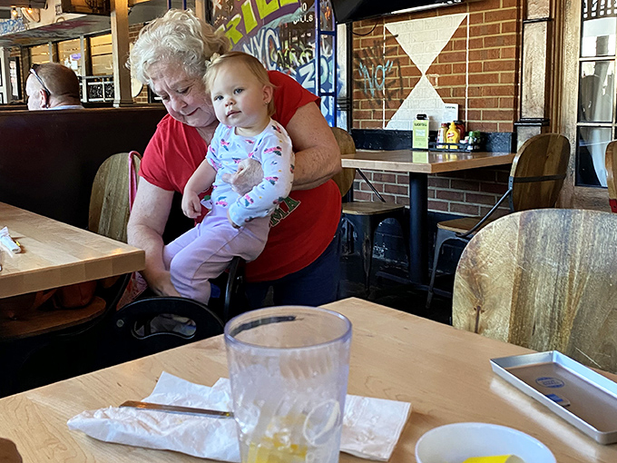 Three generations enjoying lunch together – the universal language of good food bringing families closer one pickle spear at a time.