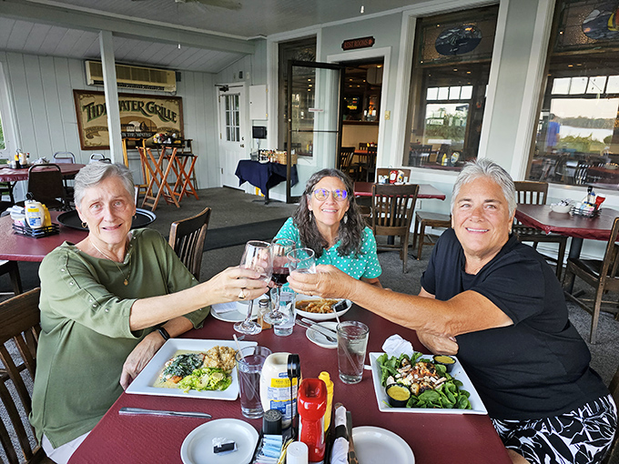 Toasting to good times with good company—the universal language of happiness. These diners know the secret: food tastes better when shared with friends.
