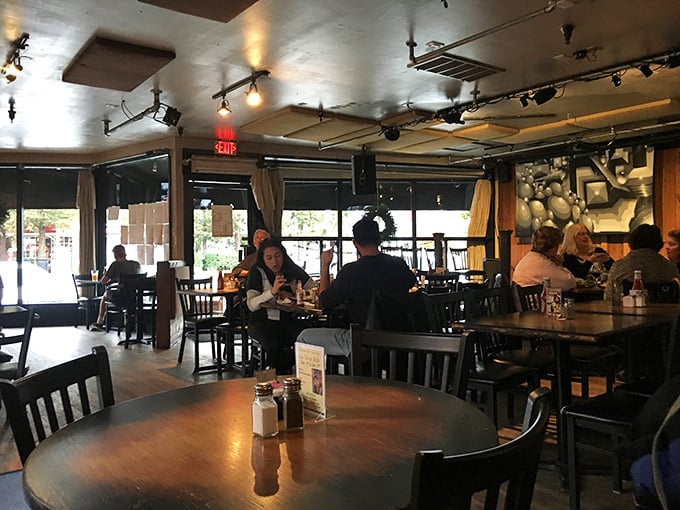 Local diners know what's good – just look at those satisfied faces enjoying another successful meal.
