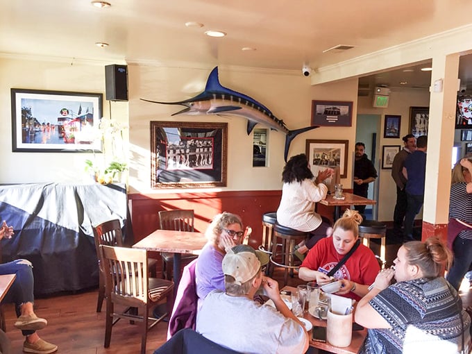 A dining room where strangers become temporary friends, united by the universal language of "wow, that looks good, what did you order?"