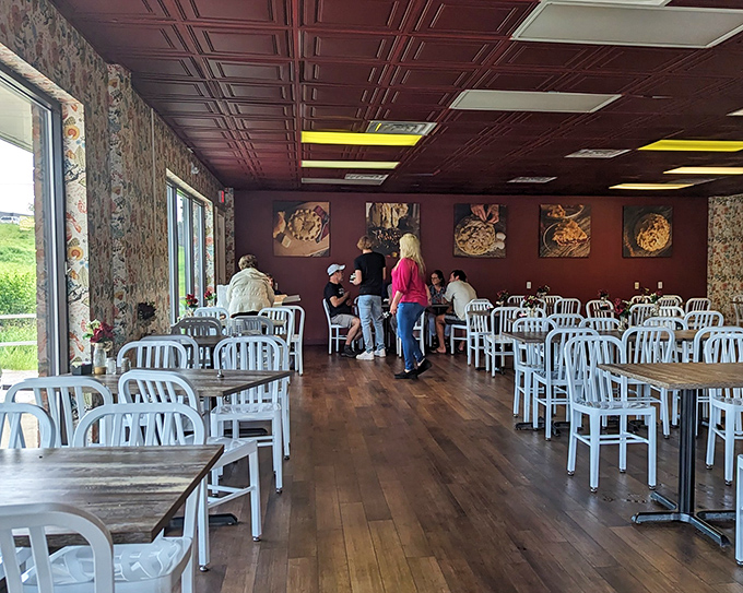 Every table tells a story of anticipation and satisfaction. These diners aren't just eating—they're participating in a time-honored ritual of small-town culinary magic.