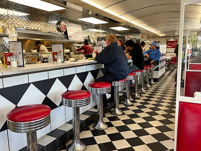 The counter seating—where solo diners become temporary neighbors and the short-order ballet unfolds before your eyes. Front-row seats to breakfast theater.