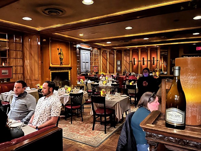 The diverse crowd proves prime rib is the great equalizer—tech executives and anniversary celebrants united in the pursuit of perfect beef.