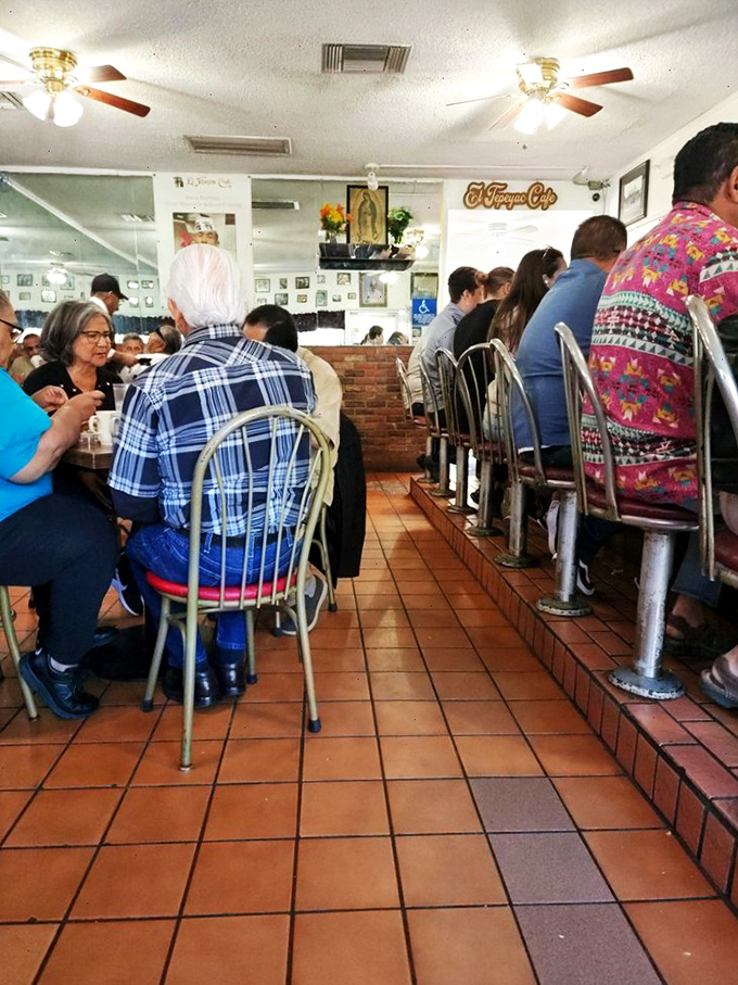 The diverse crowd tells the real story—when everyone from grandmothers to hipsters line up for the same food, you know you've found gold.