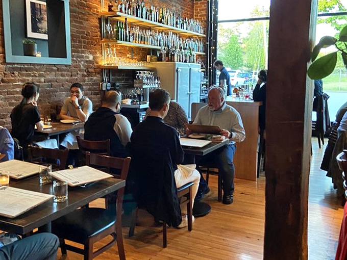 Diners lean into menus with the focused concentration of scholars studying ancient texts—except these texts promise immediate delicious rewards.