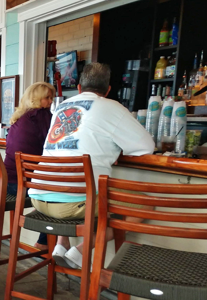 Where beach stories are exchanged over drinks – the casual bar seating at Waterman's has witnessed decades of vacation tales and local legends.